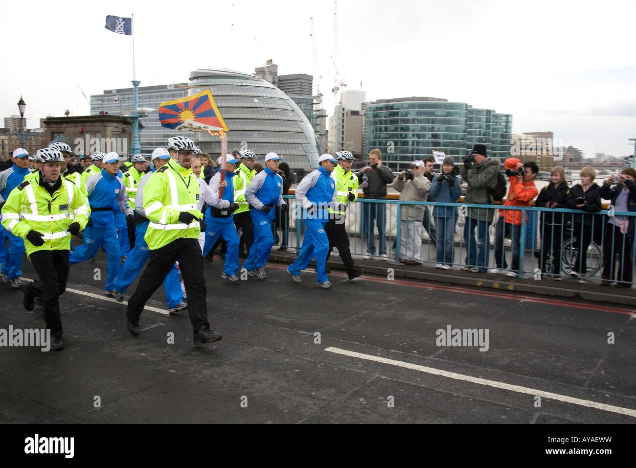Paula Radcliffe running with the Beijing Olympic torch across Tower ...