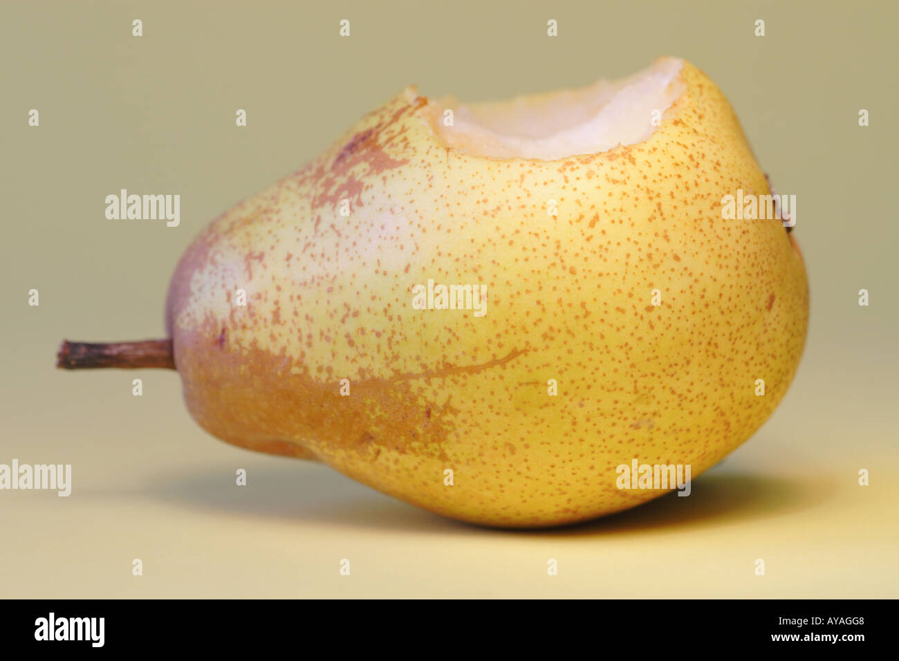 Pear fruit with bite mark Stock Photo - Alamy