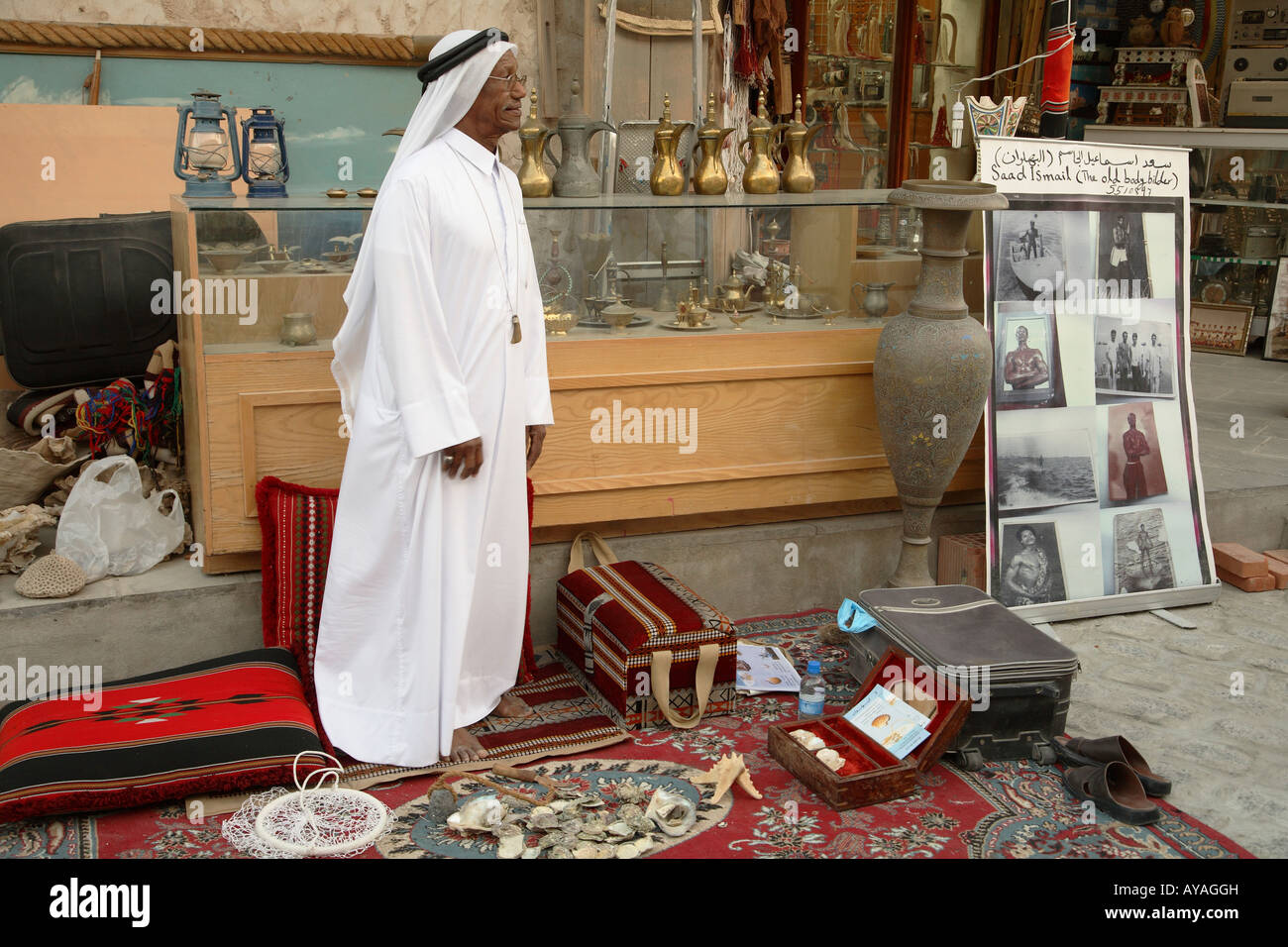 Qatar Doha Souq Waqif street scene shop vendor Stock Photo - Alamy