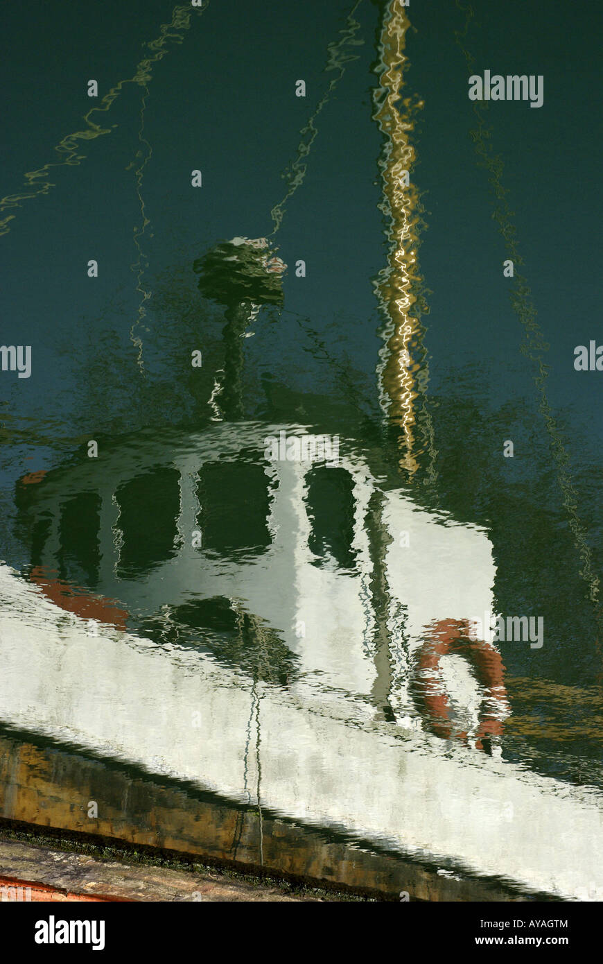 Upsidedown reflection of a boat with rippled distortion of water Stock ...