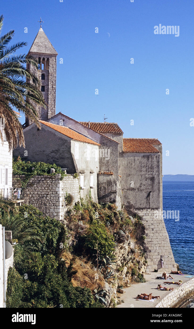 Bell towers and fortified sea wall in Rab Town Stock Photo - Alamy