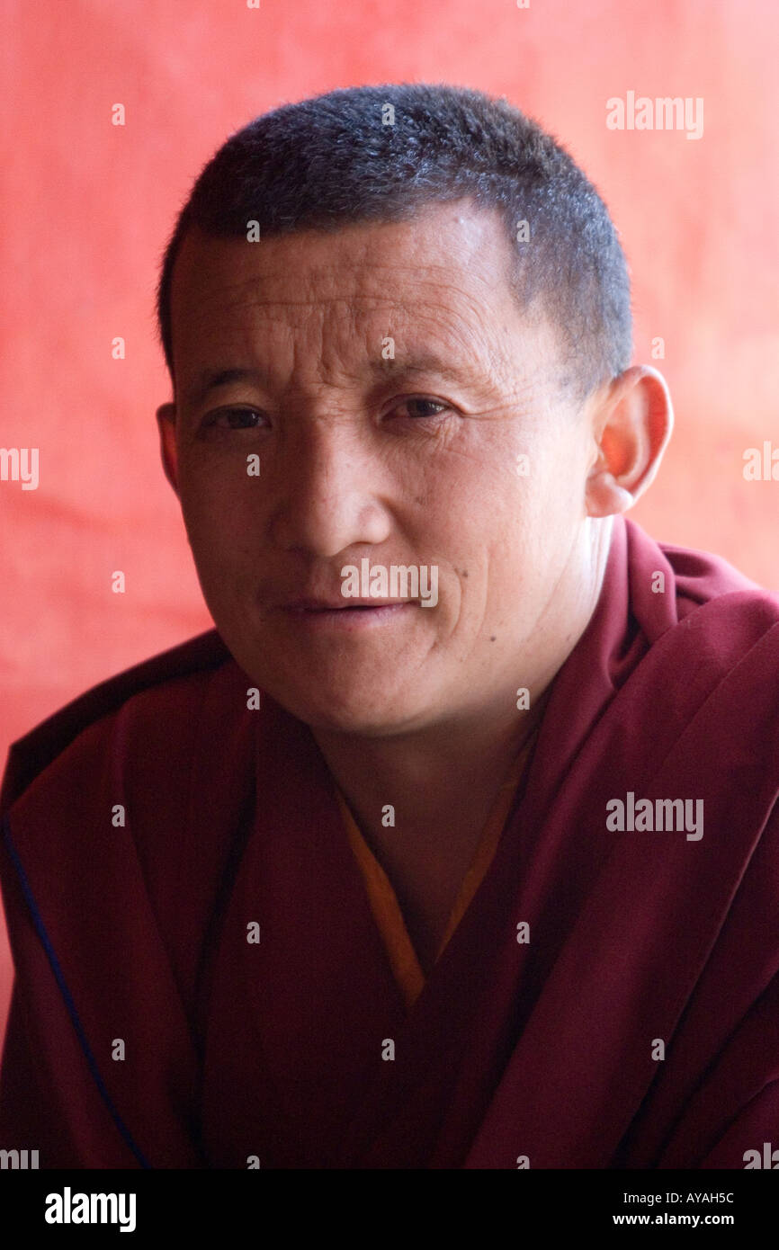 Tibetan Buddhist monk backlit by window in the Drepung Monastary in ...