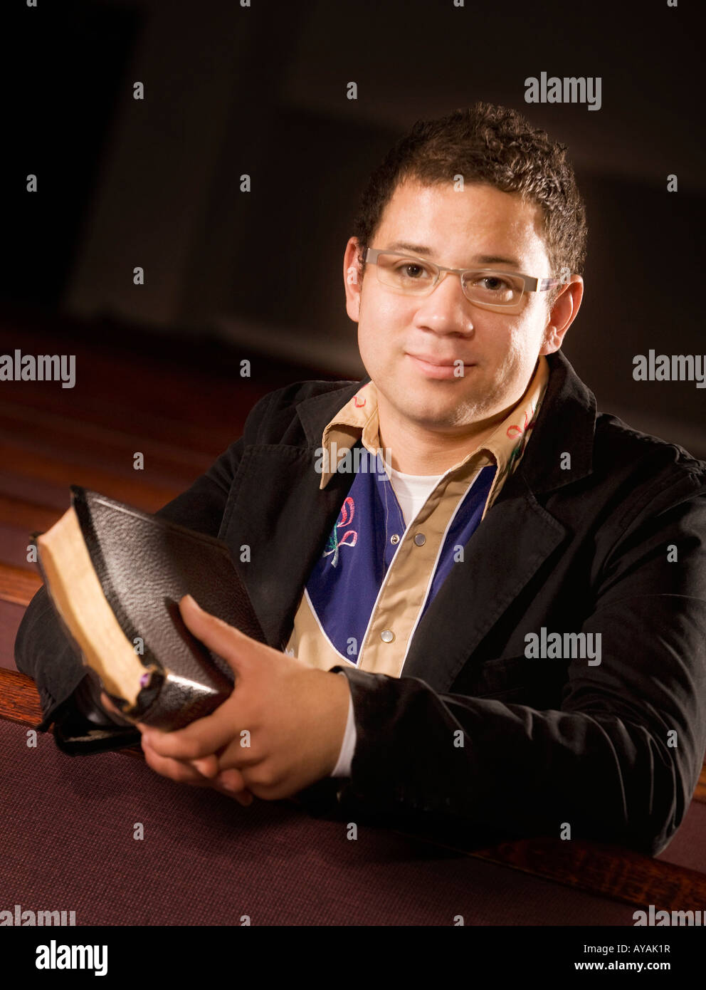 Man holding a Bible Stock Photo - Alamy