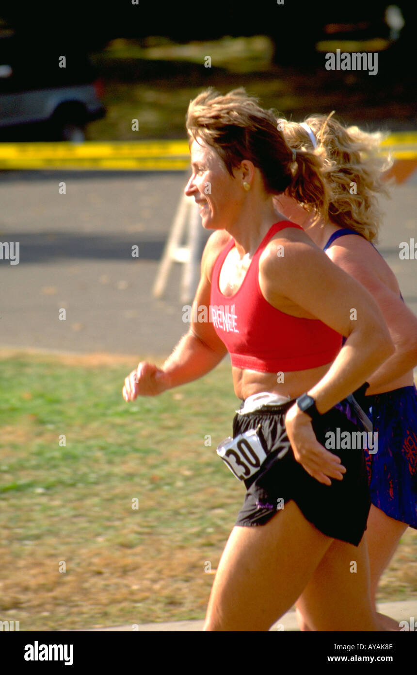 Twin Cities Marathon runners age 45 near finish. St Paul Minnesota USA ...