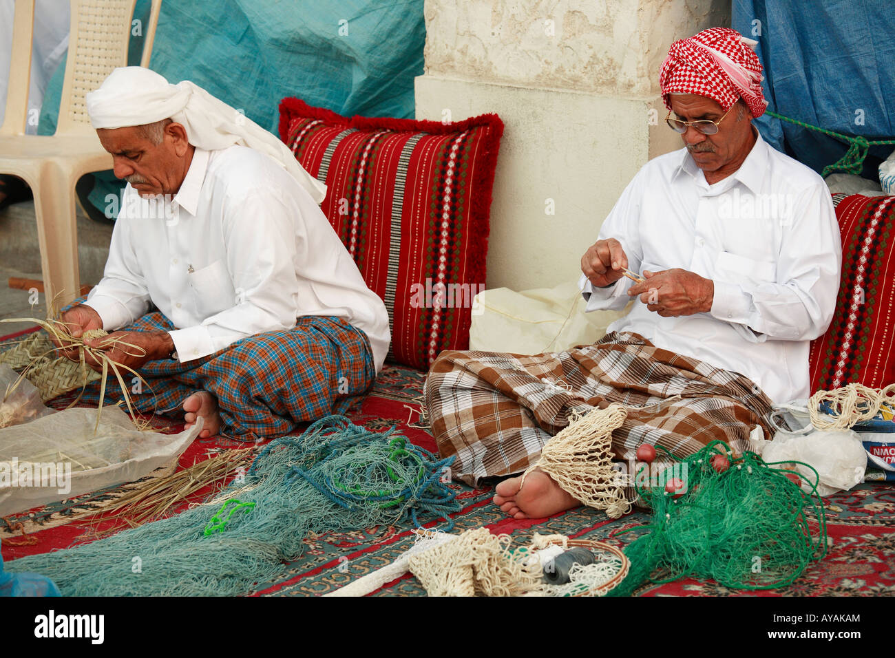 Qatar Doha Souq Waqif street scene craftsmen Stock Photo - Alamy