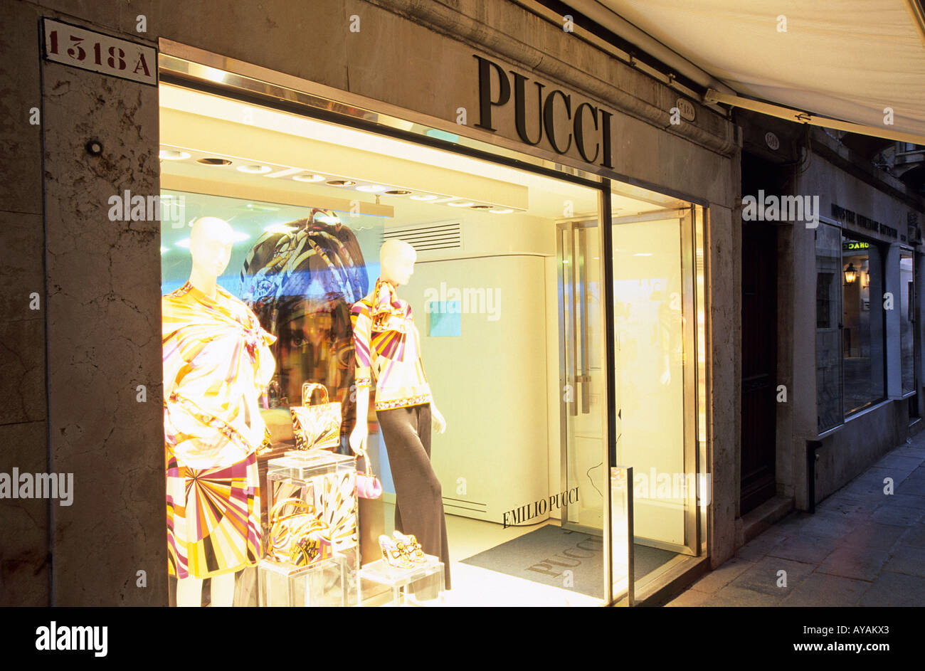 Pucci designer clothes shop exterior window display Stock Photo - Alamy