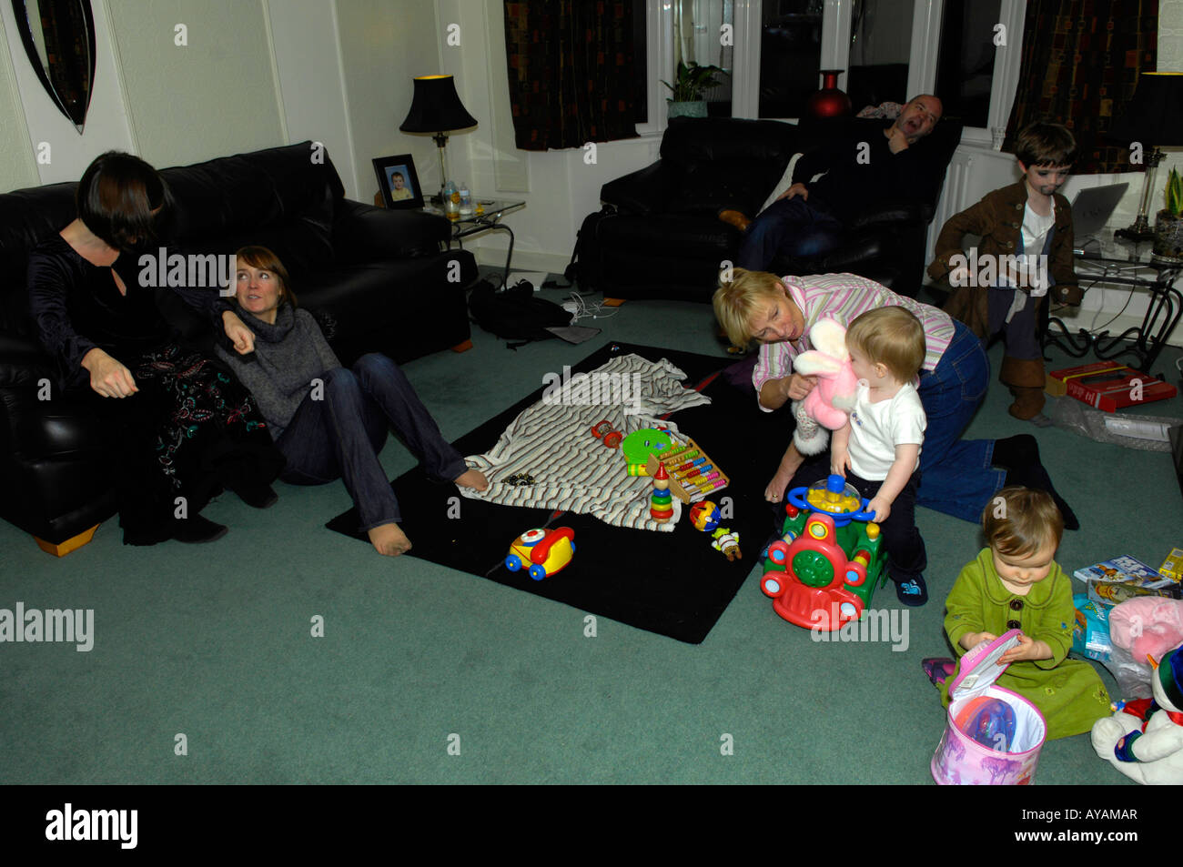 family living room kids adults parents play life inside lving room ...