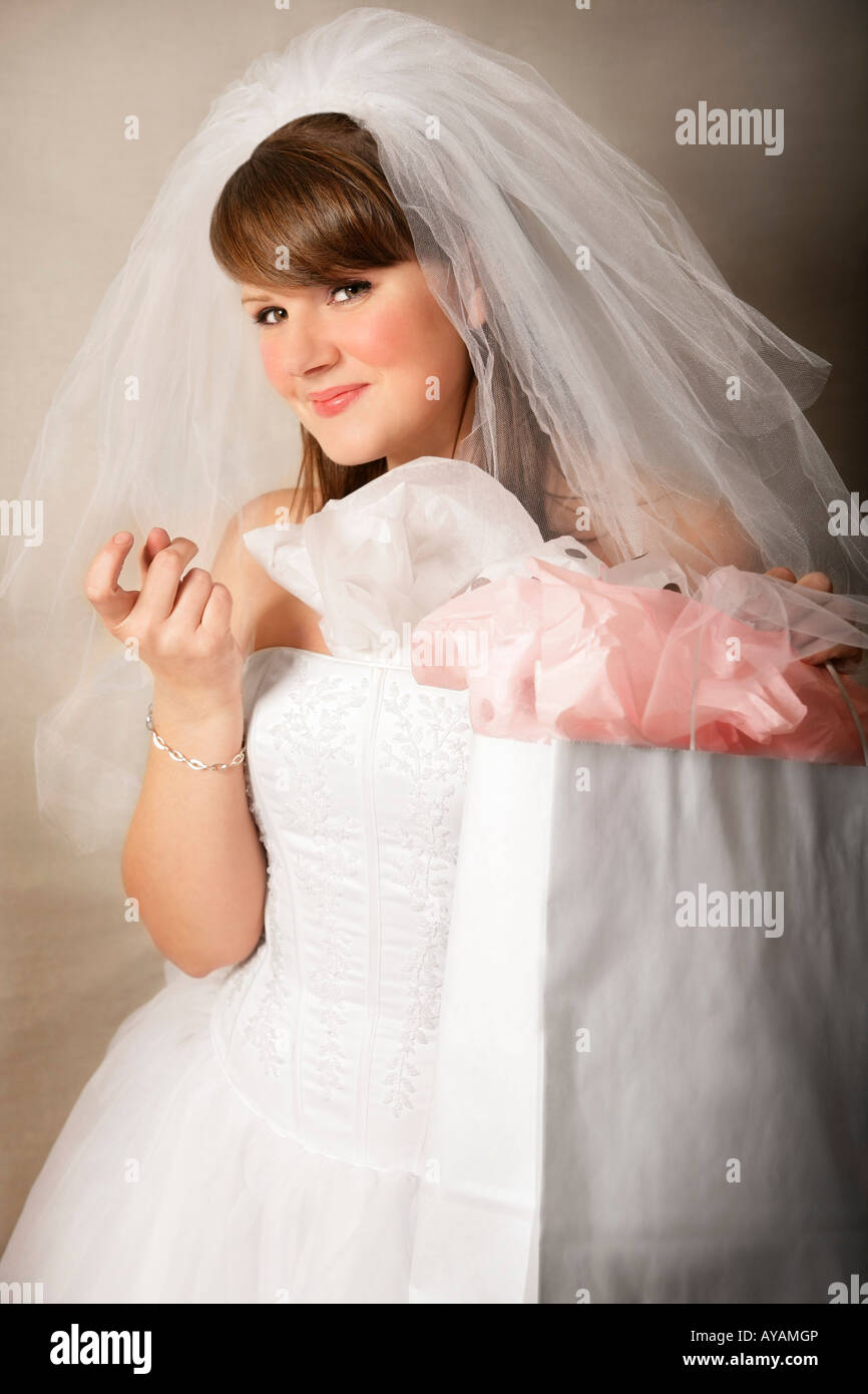 Bride with wedding present Stock Photo - Alamy