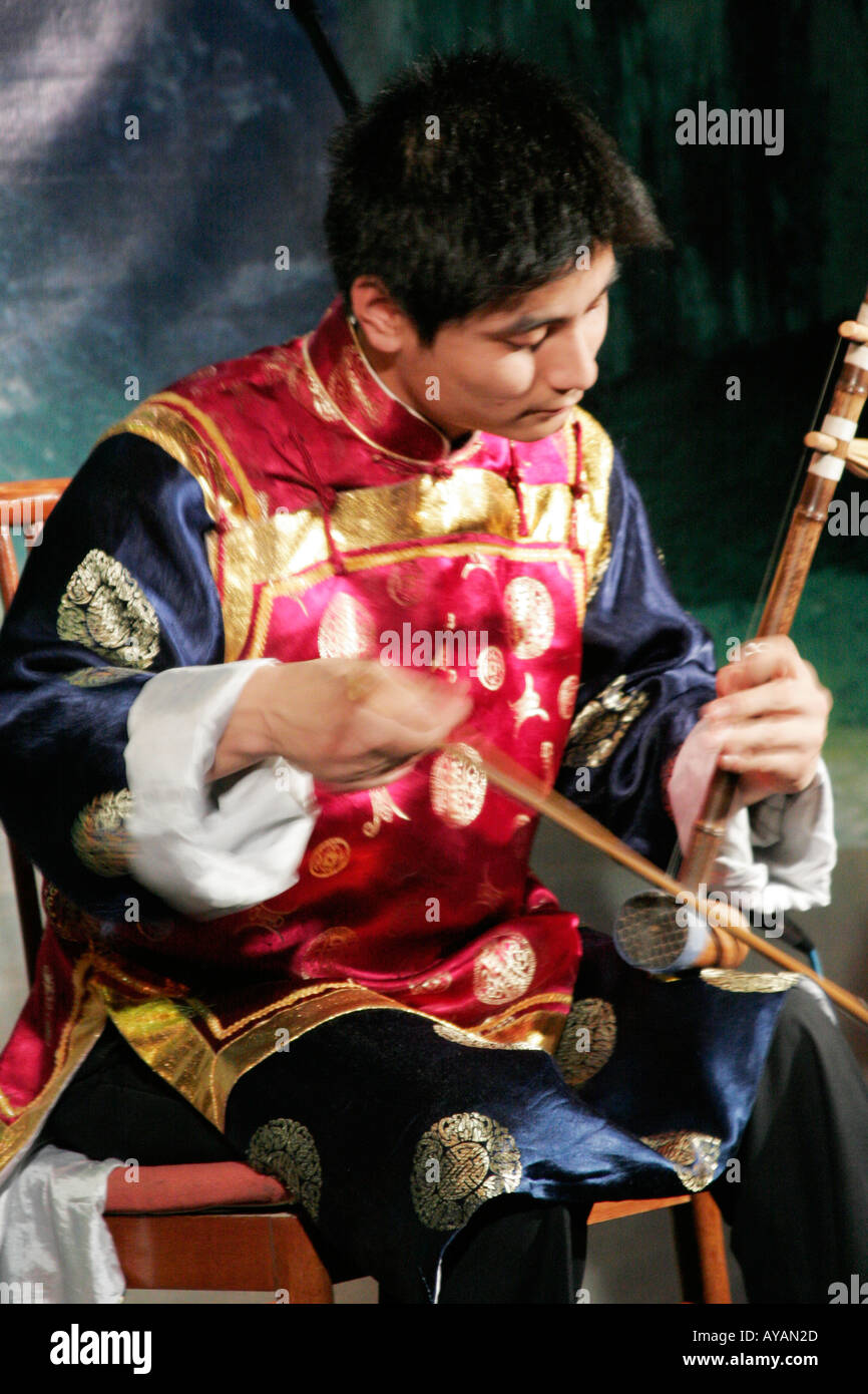 Asian man playing on classical hi-res stock photography and images - Alamy