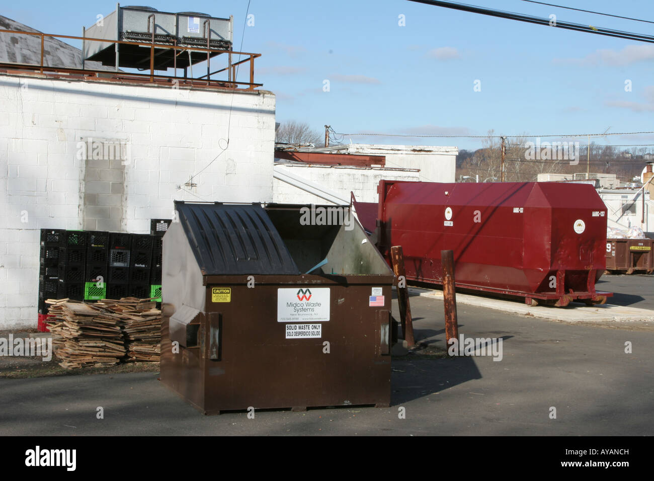 compactor and dumpster Stock Photo - Alamy