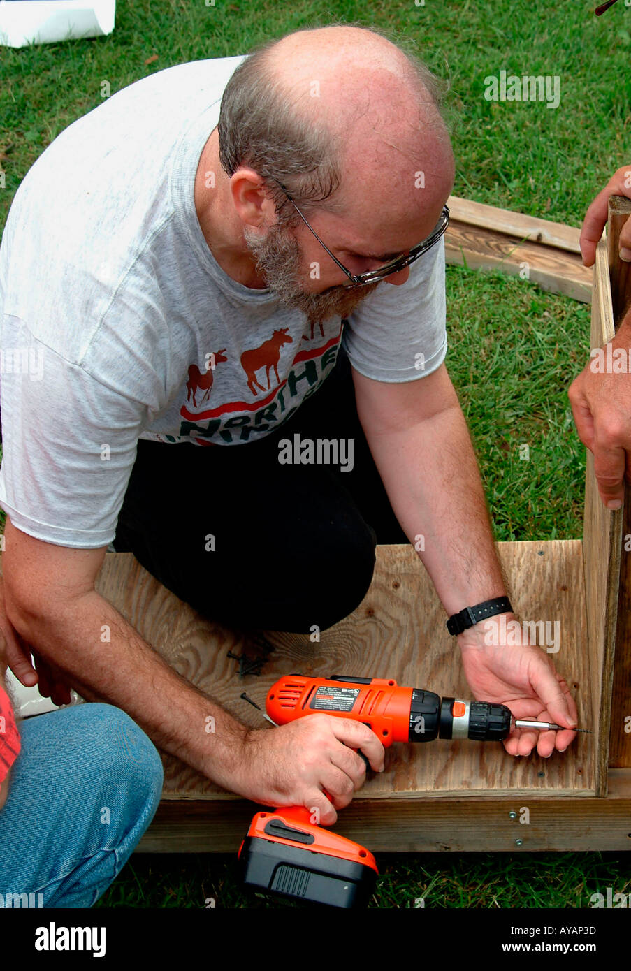 man using electric screwdriver on carpentry project Stock Photo - Alamy