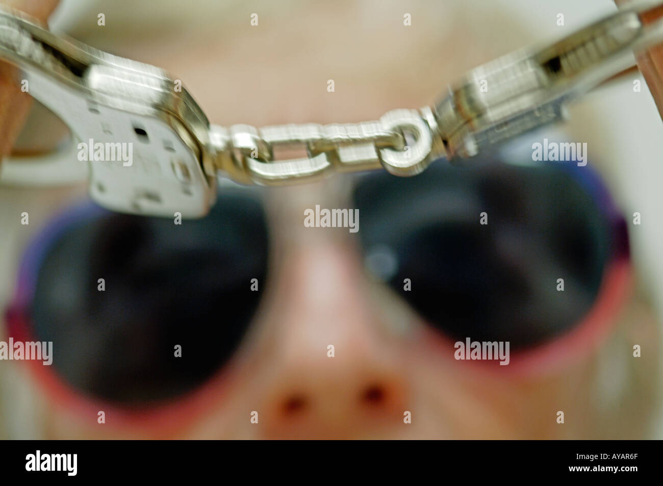 arrested drunk woman driver displaying handcuffs Stock Photo - Alamy