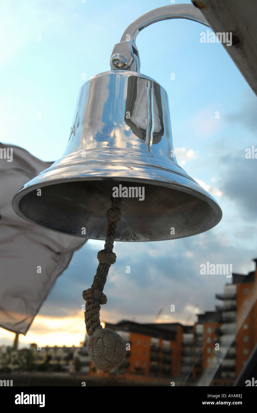 Atmospheric picture of ship's bell at dusk or twilight or sundown or ...