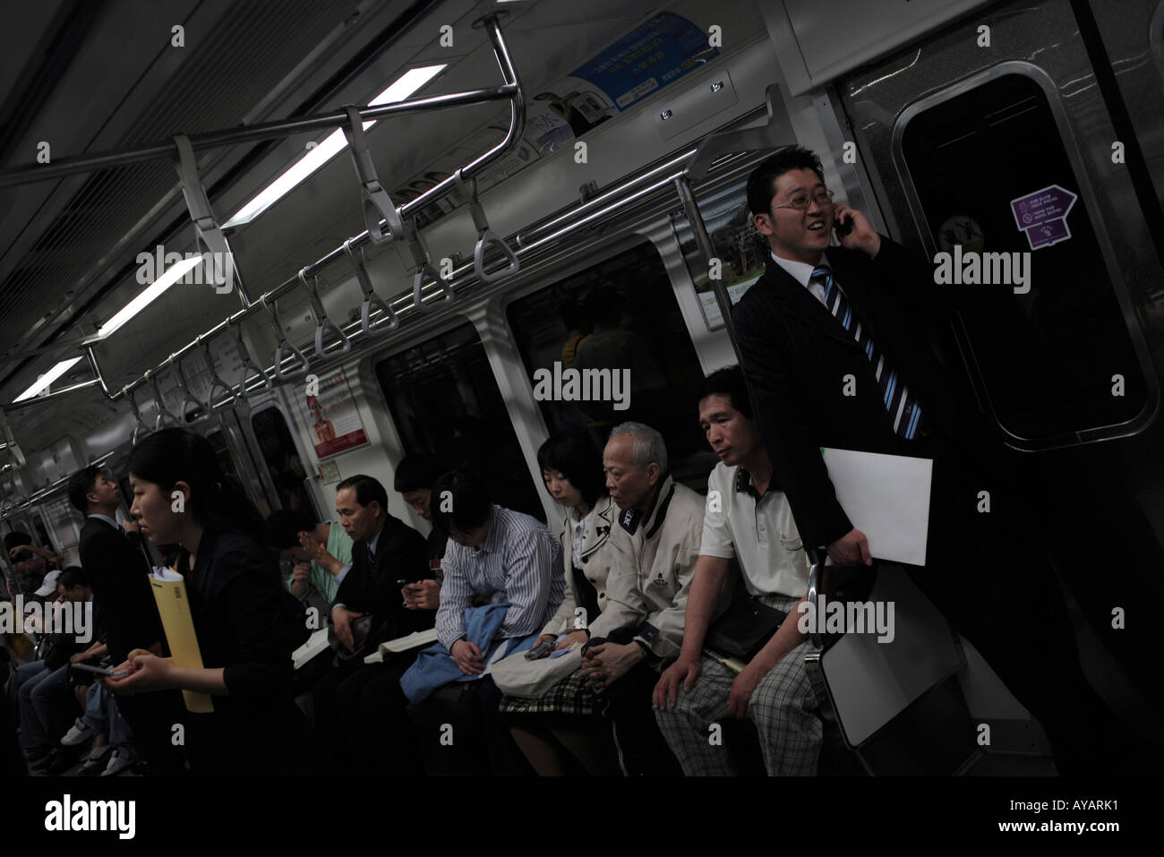 South Korea Seoul Passengers on Seoul Metro commuter train during ...