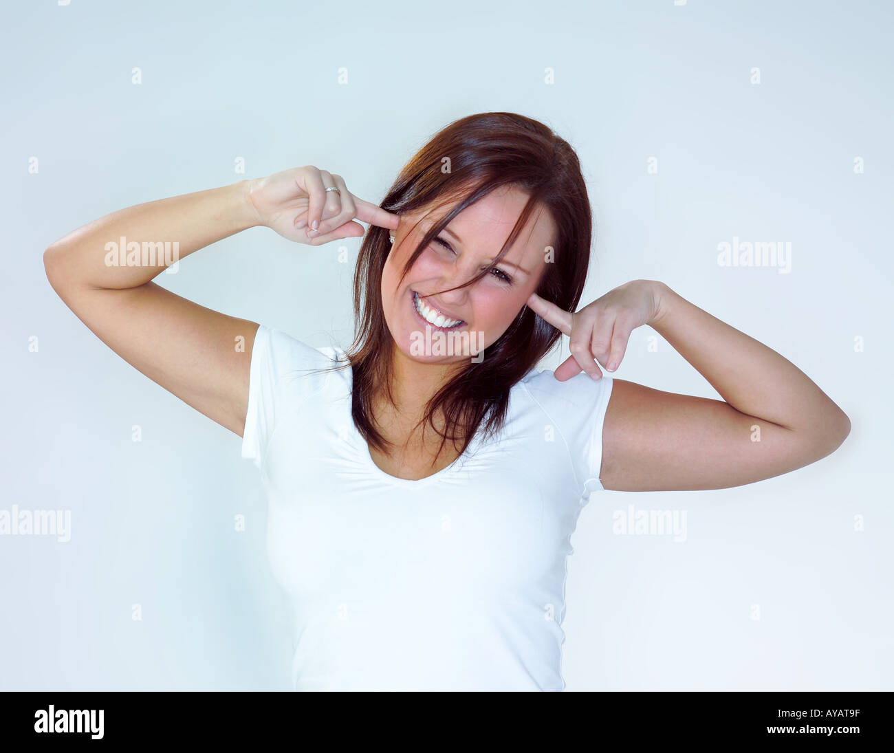 Fingers in ears hi-res stock photography and images - Alamy