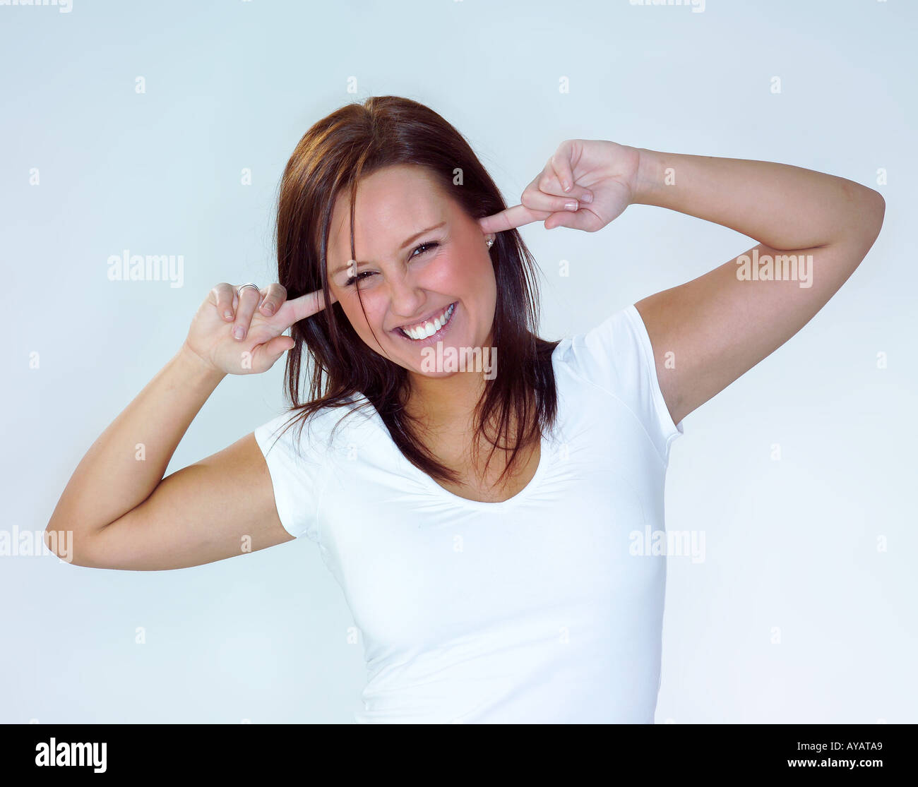 Fingers in ears hi-res stock photography and images - Alamy