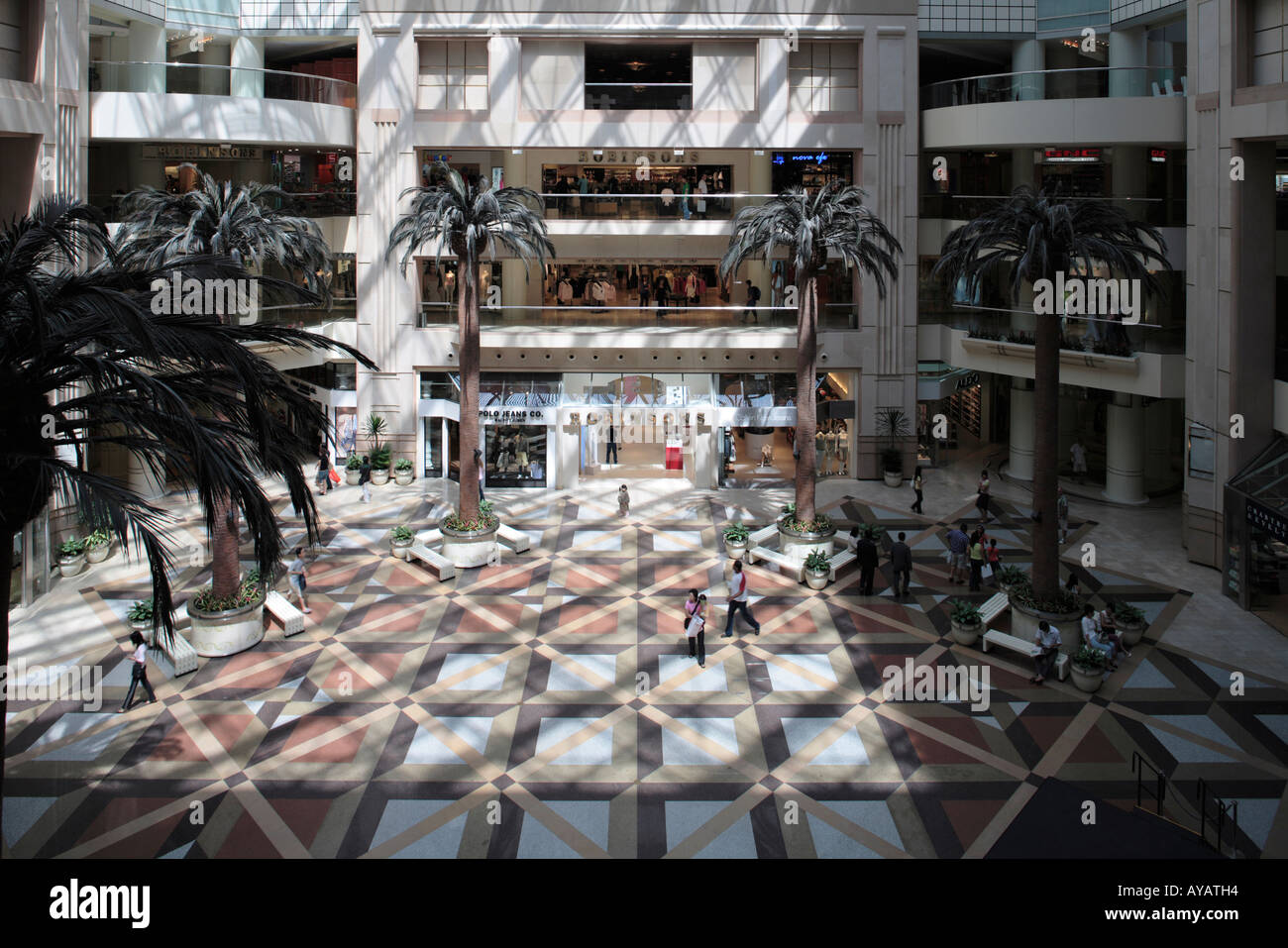 Asia Singapore Interior view of shopping atrium inside Raffles City ...