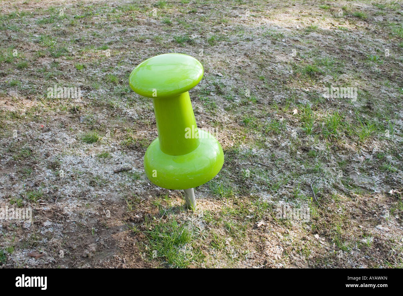Green pin on the grass Stock Photo - Alamy