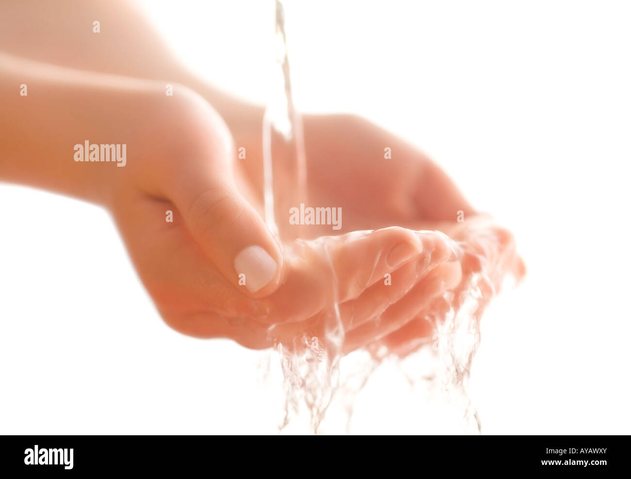 Water in hands Stock Photo - Alamy