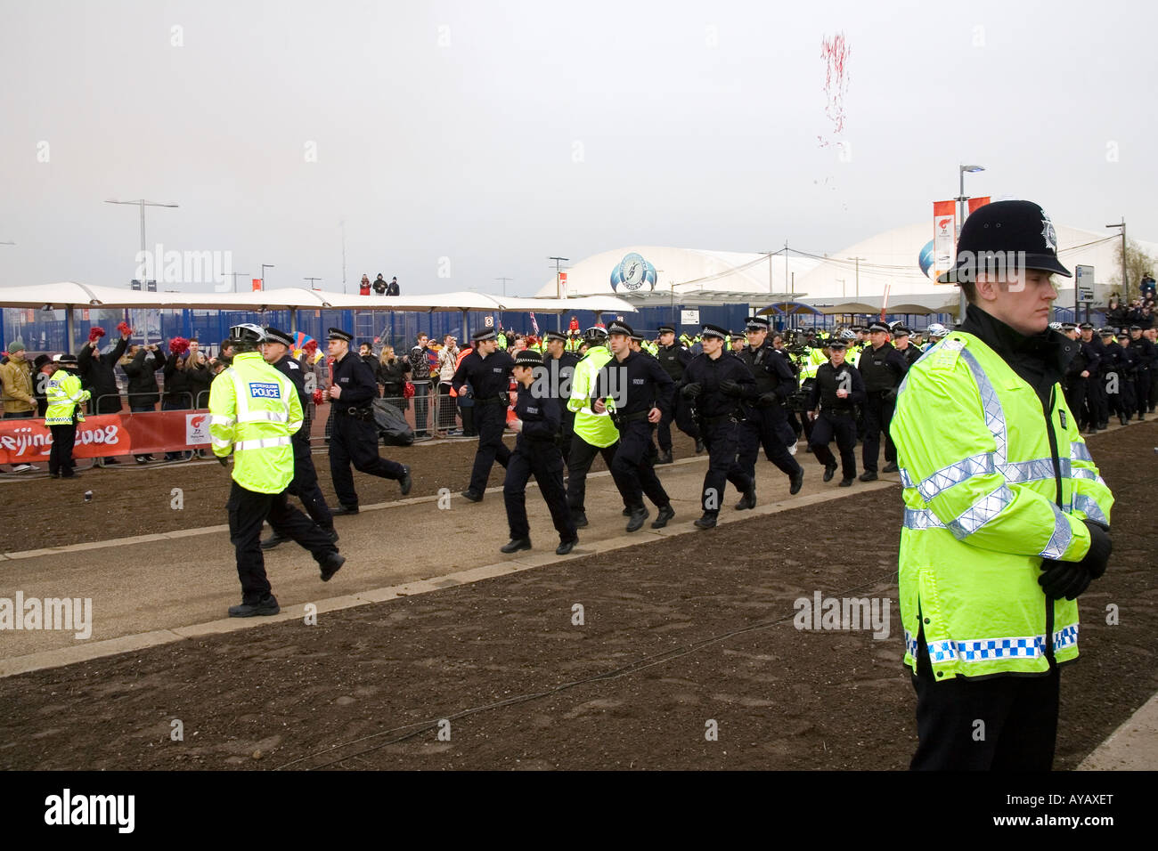 Olympian Dame Kelly Holmes carrying the Olympic torch (Beijing 2008) in ...