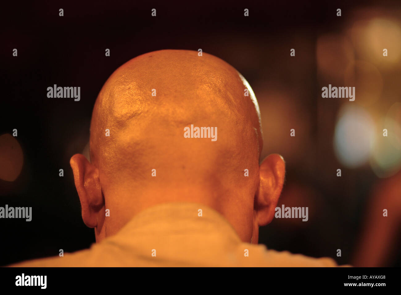 Taiwan Taipei Rear view of shaved monks head at prayer inside Long Sham ...
