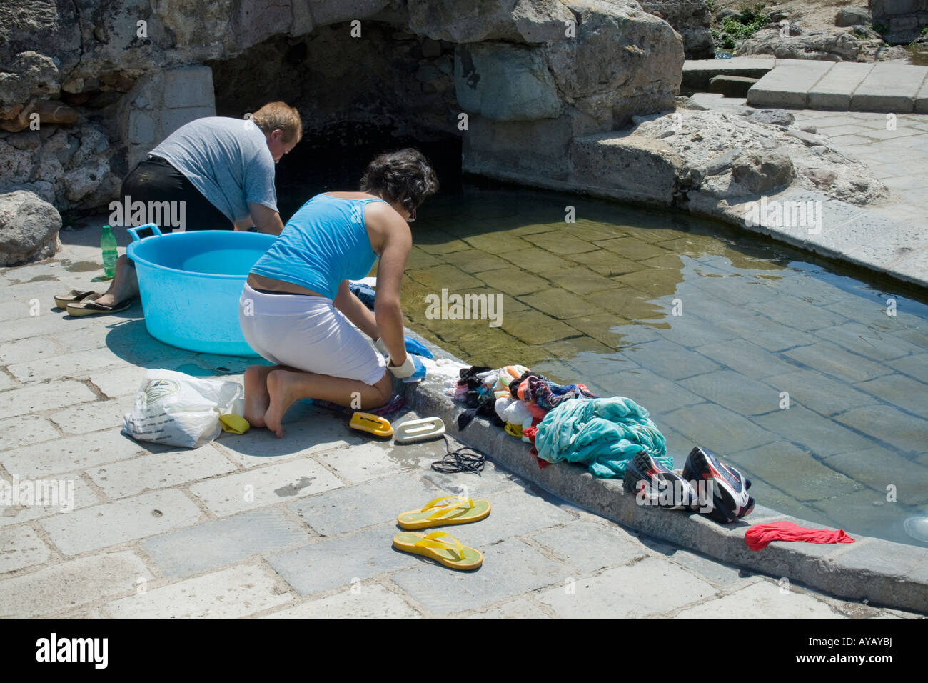 Local women washing clothes at Terme Romane in Fordongianus Sardinia ...