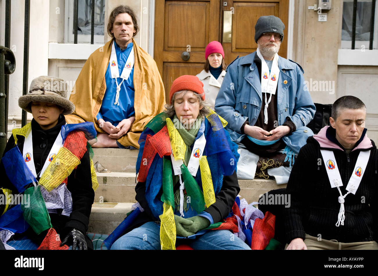 Protesters In Meditation At The Free Tibet Demo Against The Chinese ...