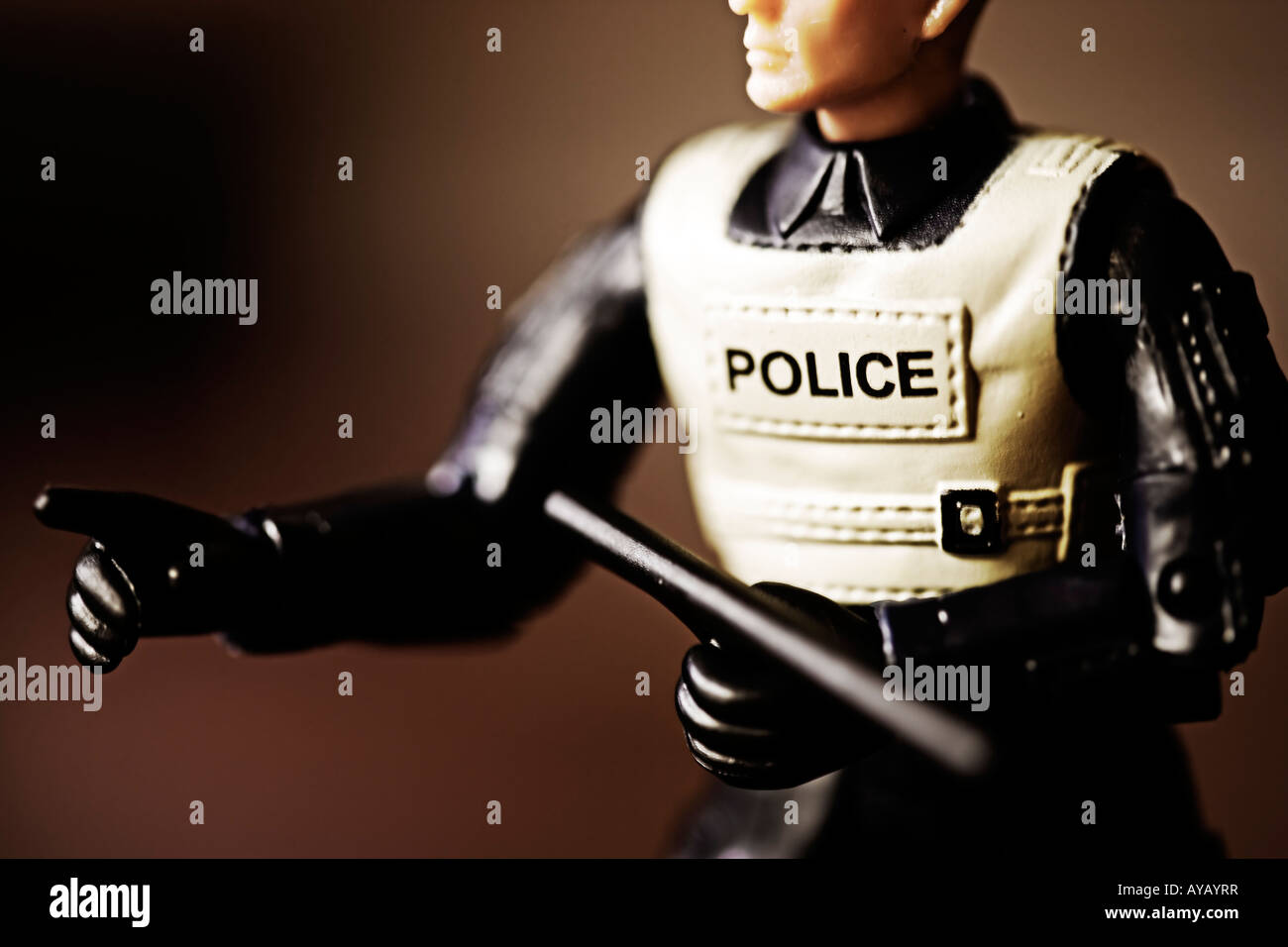 Toy Police figure made of plastic Close up Stock Photo - Alamy