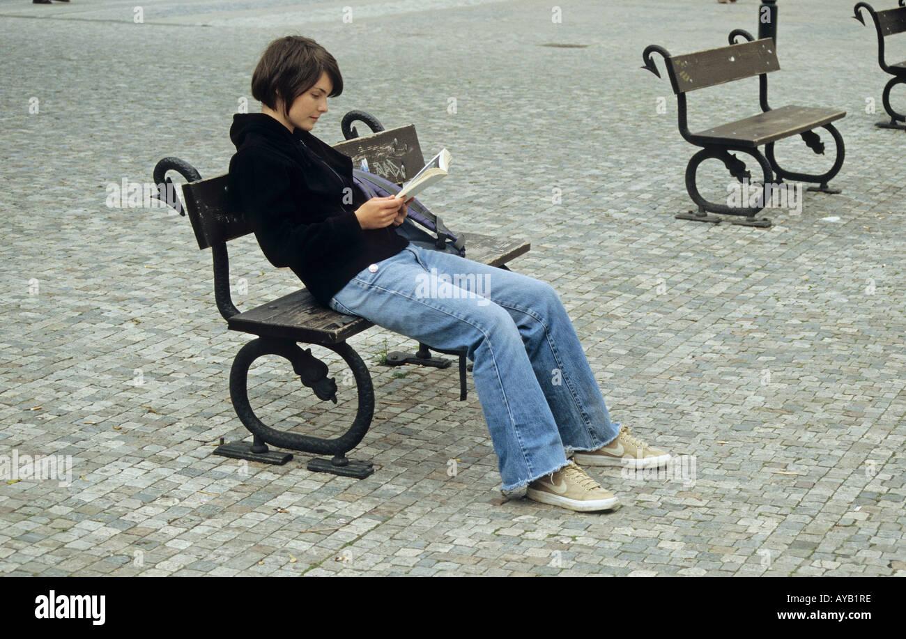 Girl reading book on Namesti Republiky or Republic Square Prague MODEL ...
