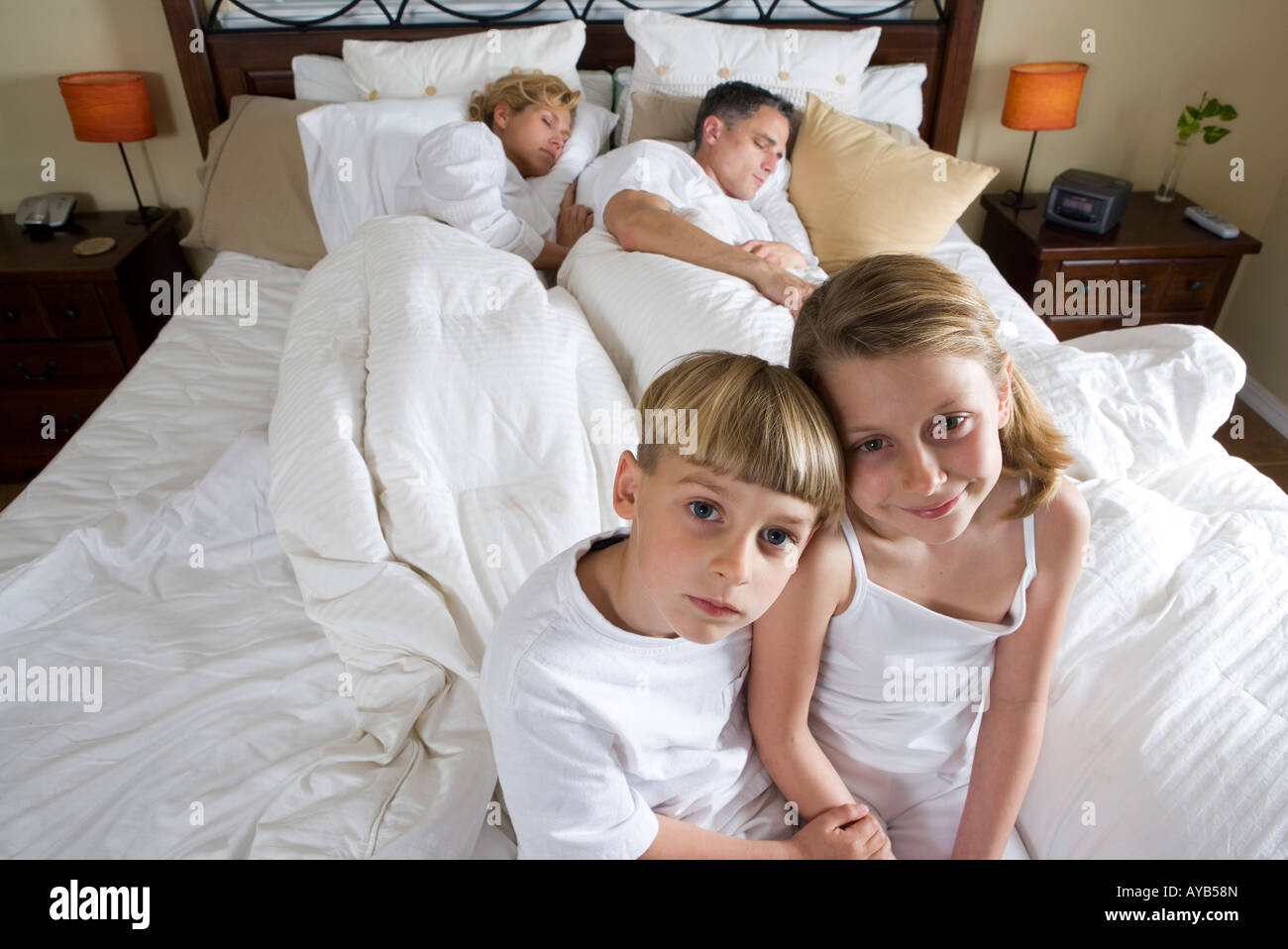 Children waiting for parents to wake up Stock Photo - Alamy