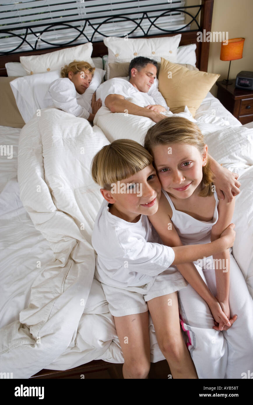 Children waiting for parents to wake up Stock Photo - Alamy