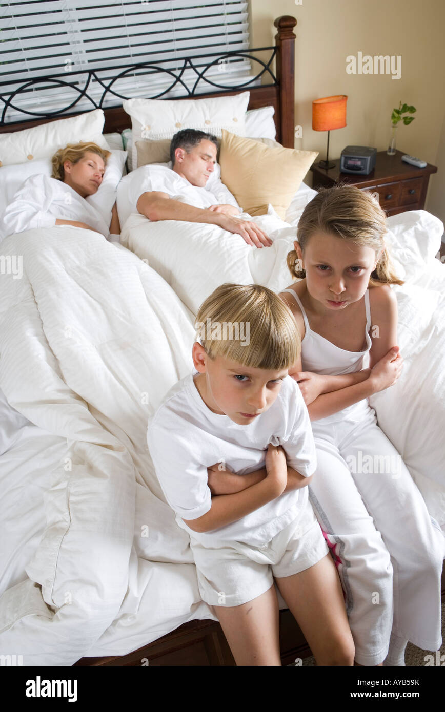 Children waiting for parents to wake up Stock Photo - Alamy