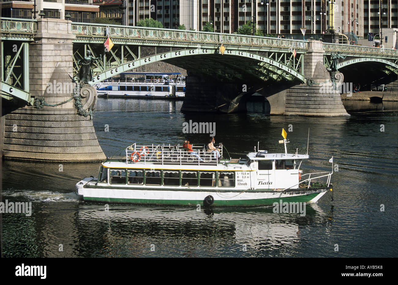Tour boat and Cechuv Bridge over the river Vltava Prague Stock Photo ...