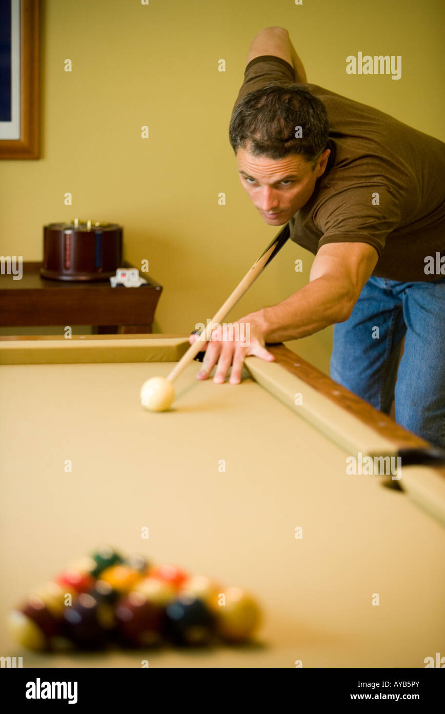 View of a man shooting pool Stock Photo - Alamy