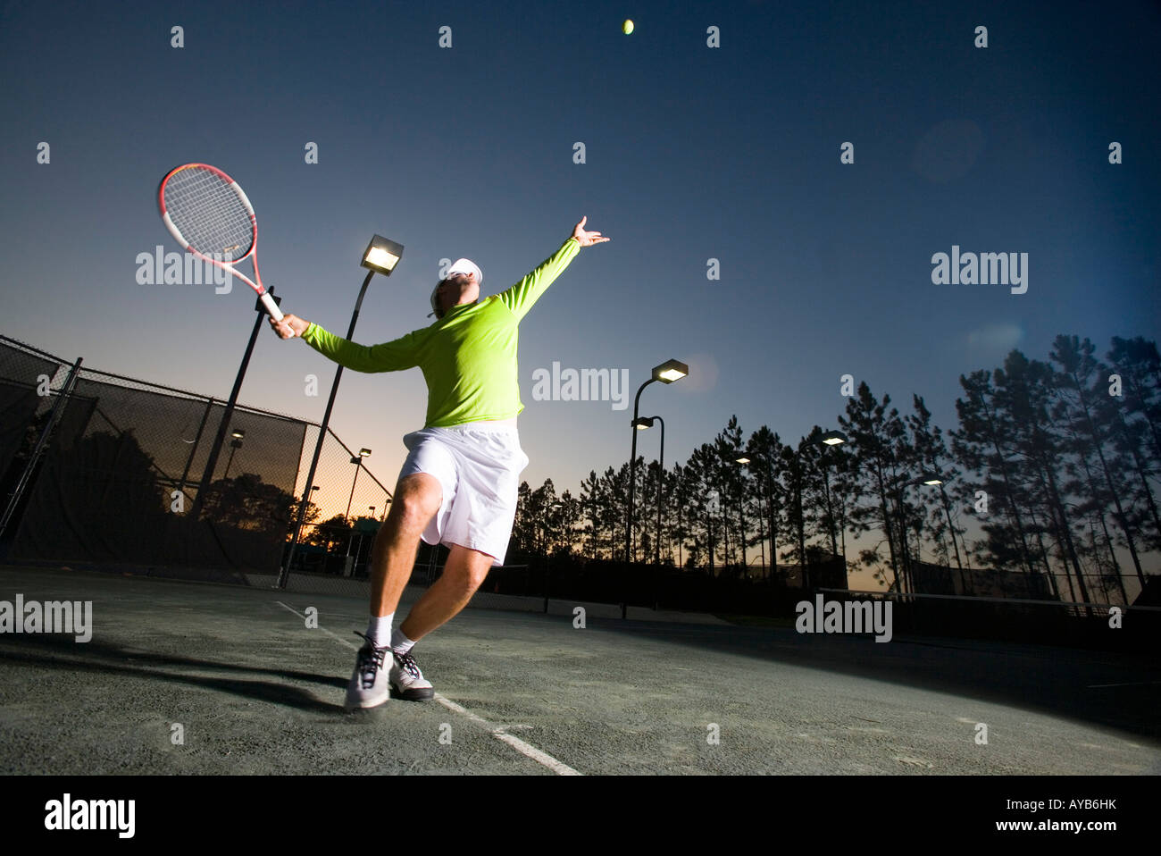 Tennis player serving Stock Photo - Alamy