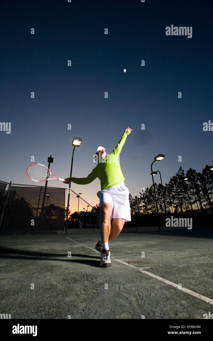 Tennis player serving Stock Photo - Alamy
