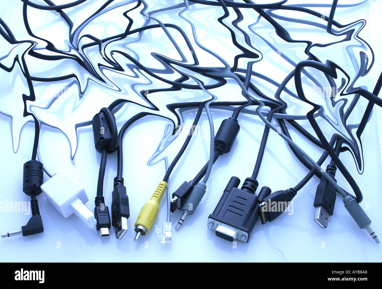 Conceptual image showing a mass of computer related cables and wires ...