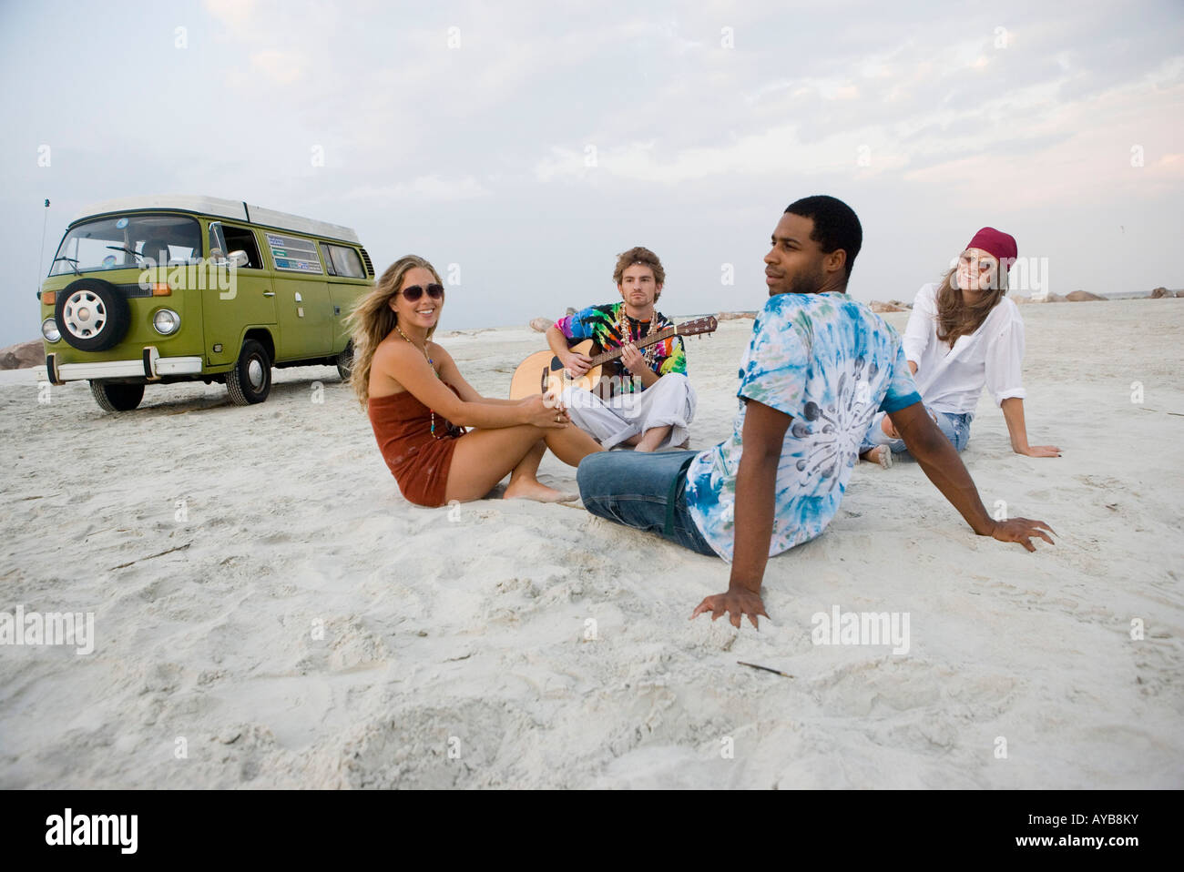 Hippies hanging out at the beach Stock Photo - Alamy