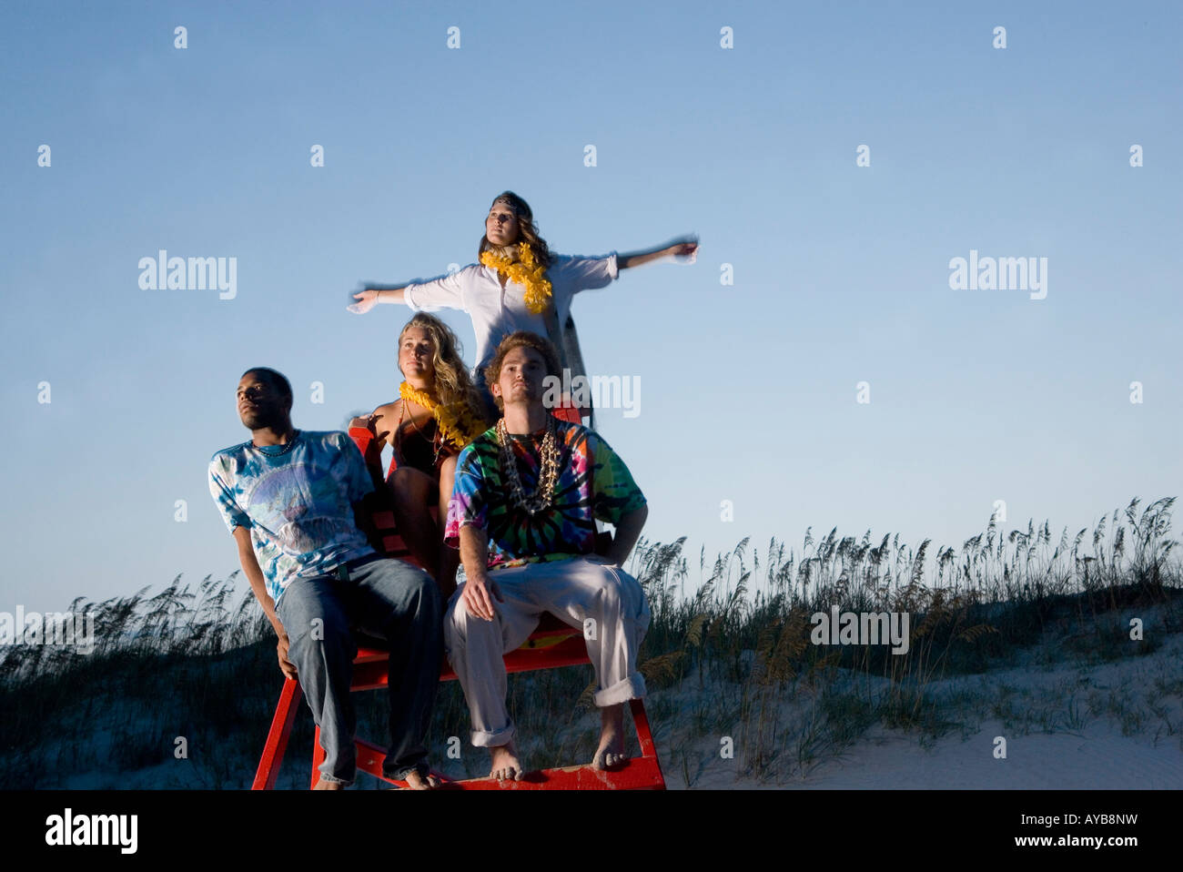 Hippies hanging out at the beach Stock Photo - Alamy