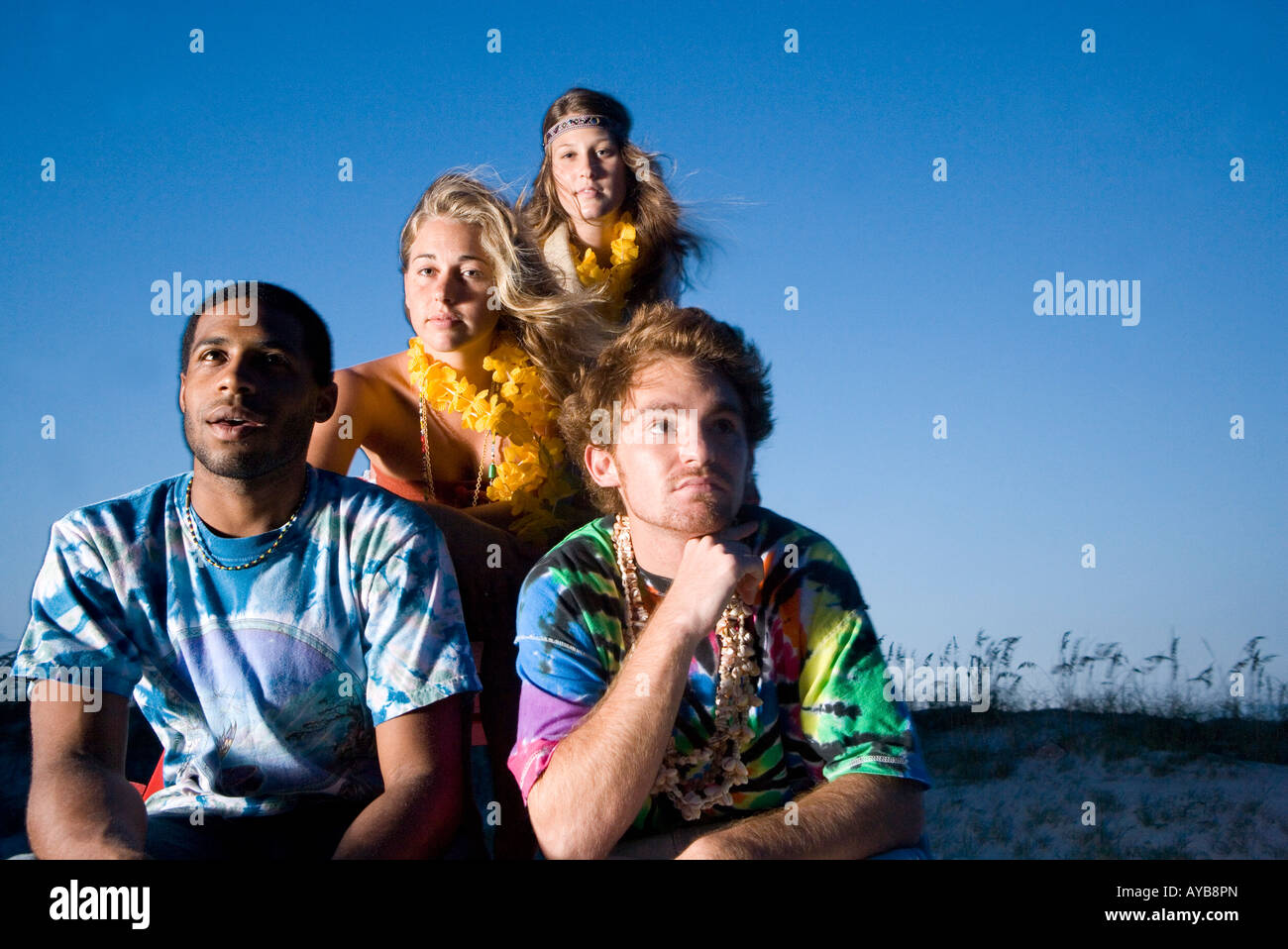 Hippies hanging out at the beach Stock Photo - Alamy