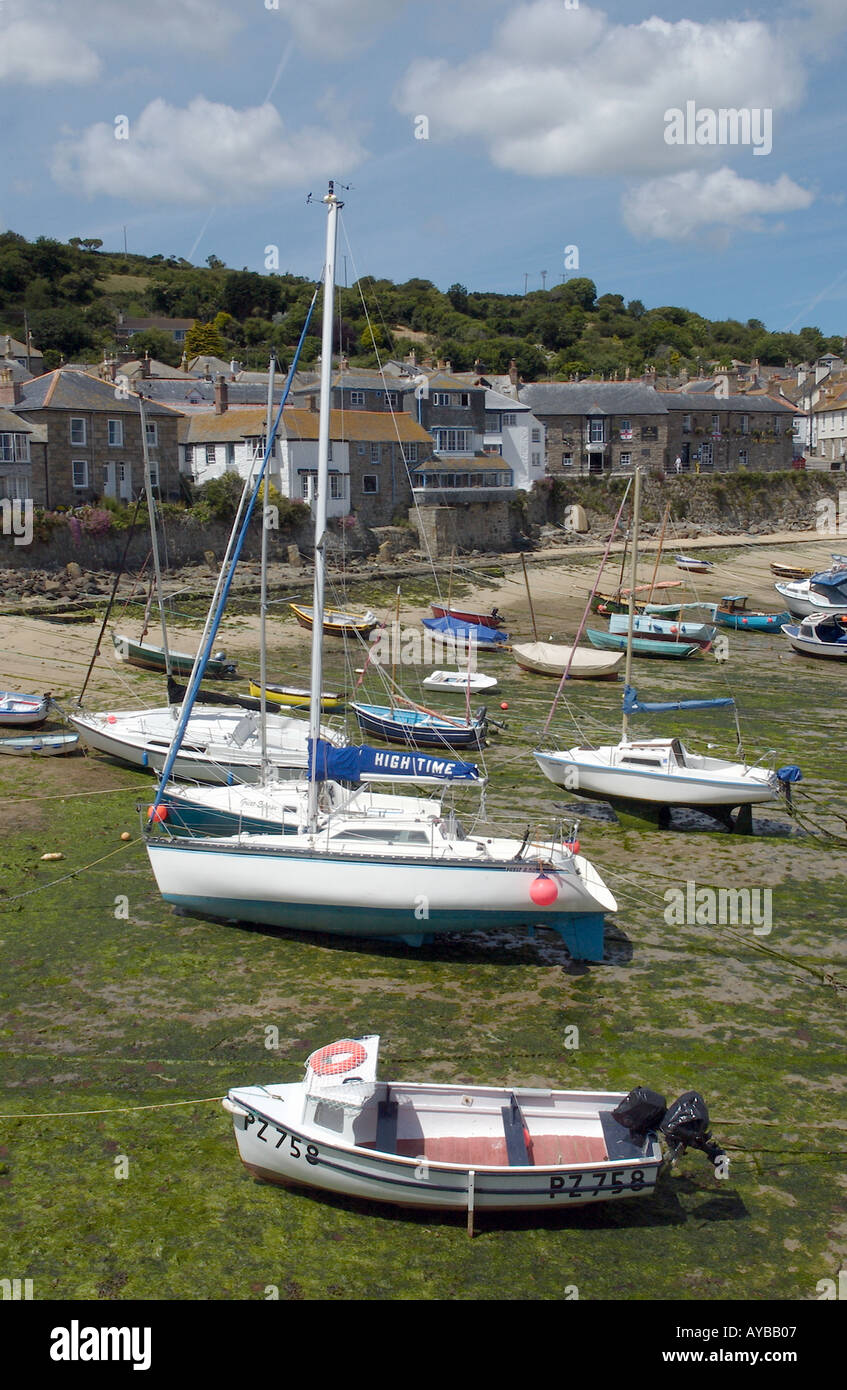 Low tide at Mousehole harbour in Cornwall England UK Stock Photo - Alamy