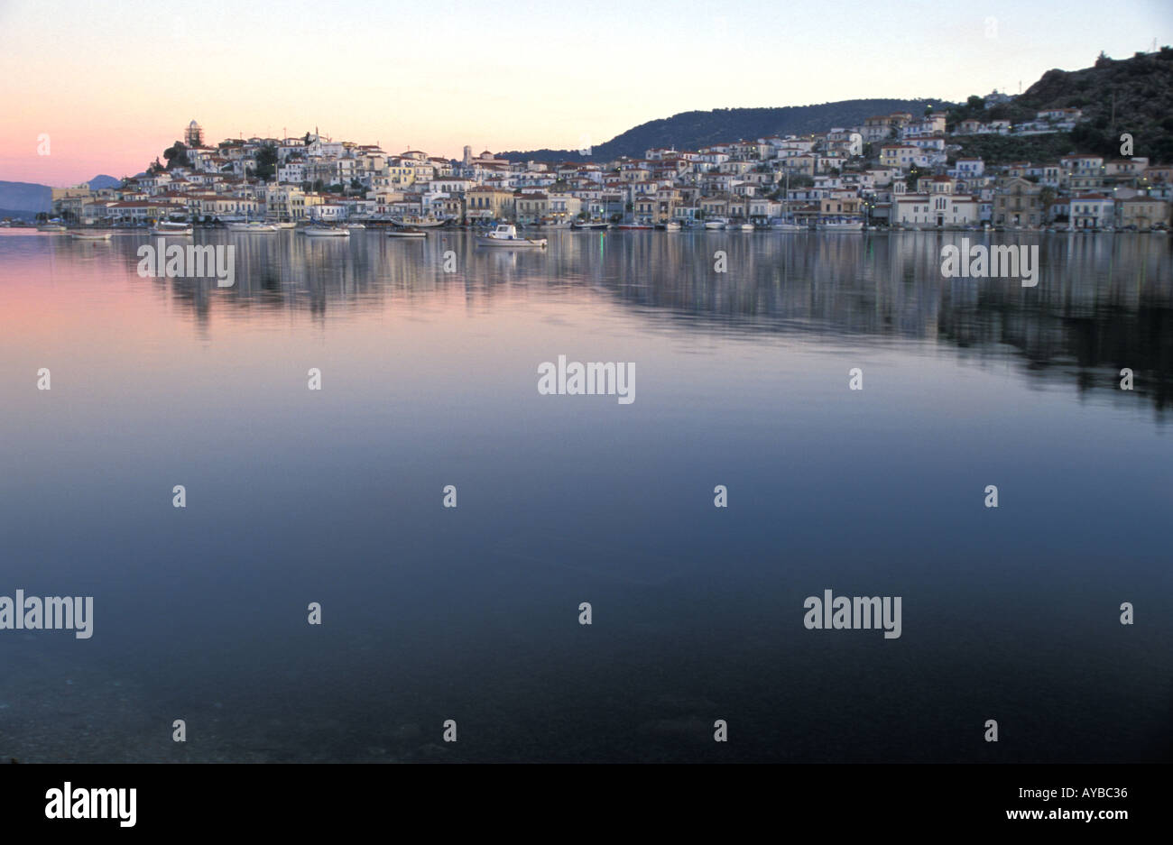 Sunrise over the historic center of Poros Poros island Saronian islands ...