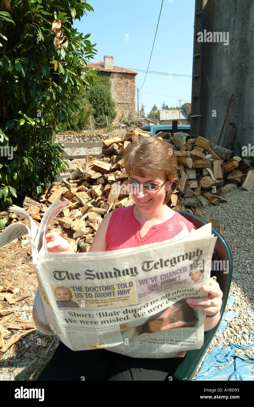 ex patsMBF974 Haute Vienne Limousin France Ex pat lady relaxing garden ...