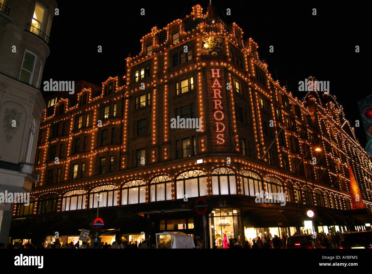 A seasonal night scene of Harrods shopping centre with Christmas lights ...