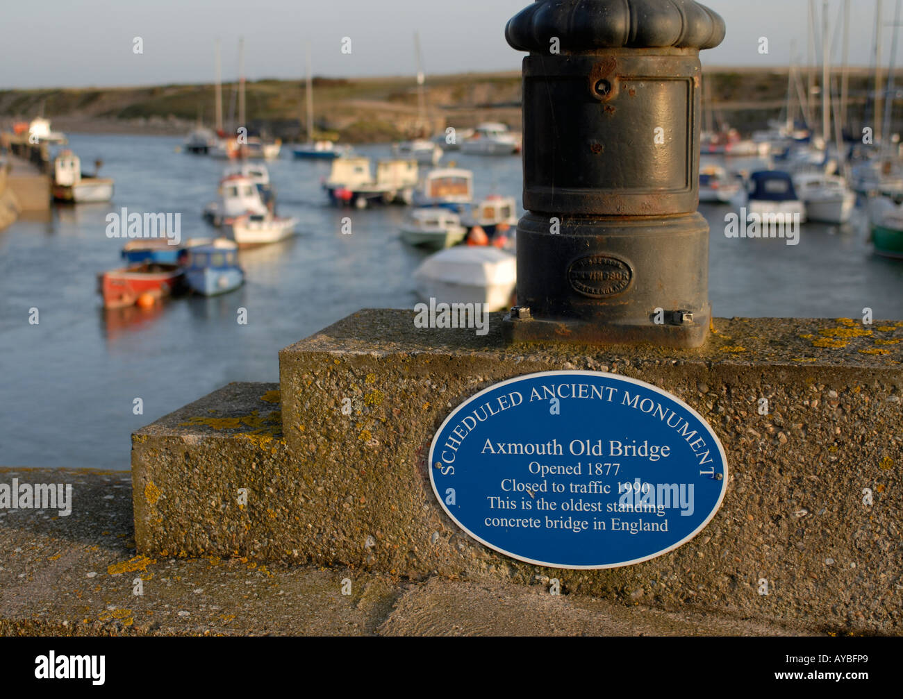 Blue plaque saying Scheduled Ancient Monument Axmouth Old Bridge Opened ...