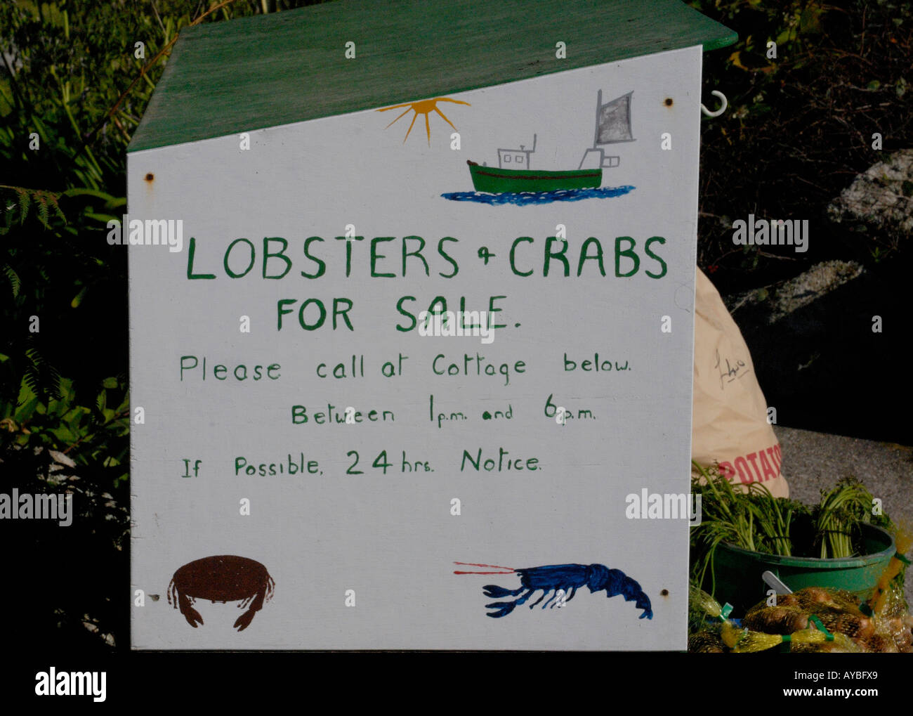 Hand painted sign offering crabs and lobsters for sale Bryher Isles of ...
