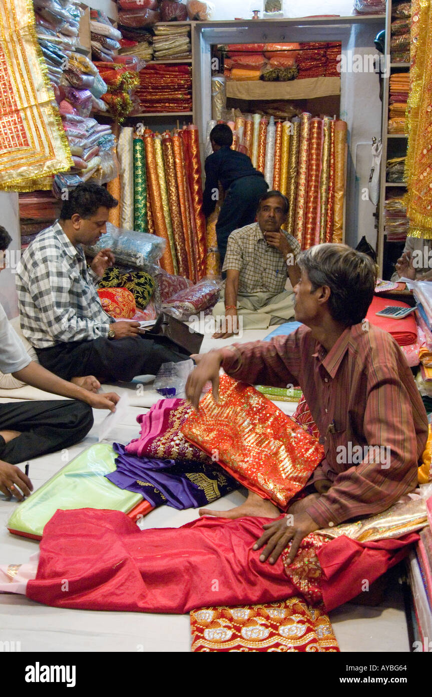Indians sat on shop floor hi-res stock photography and images - Alamy