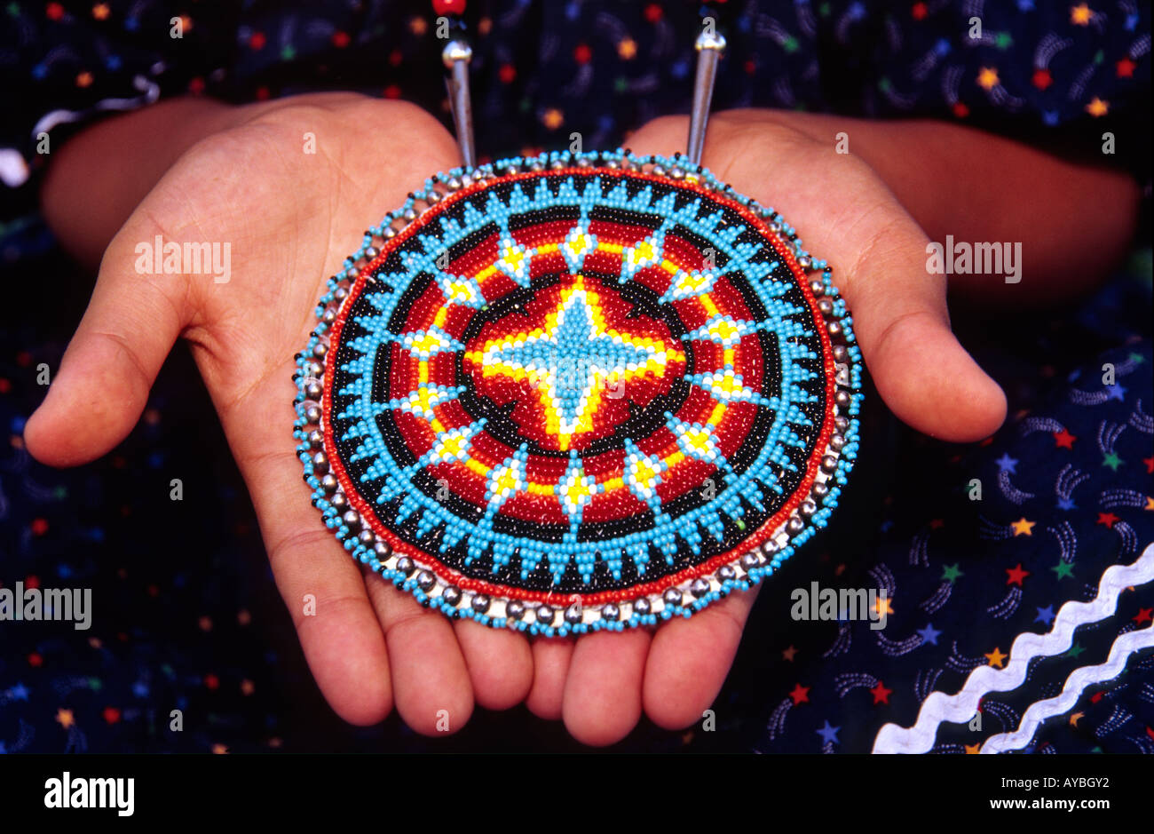 American indian girl holding bead necklace hi-res stock photography and ...