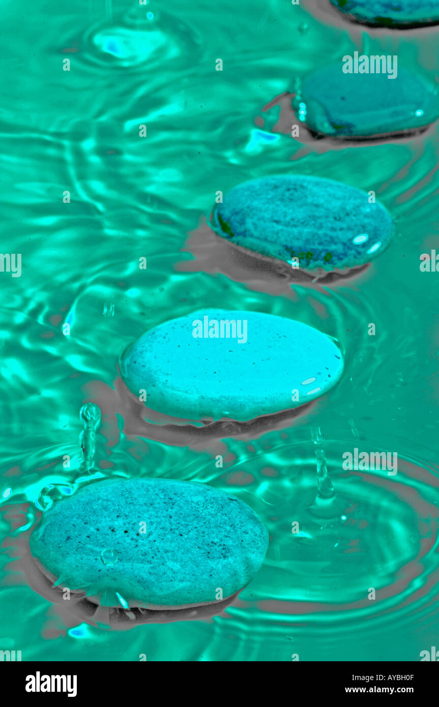 five stepping stones across water Stock Photo - Alamy