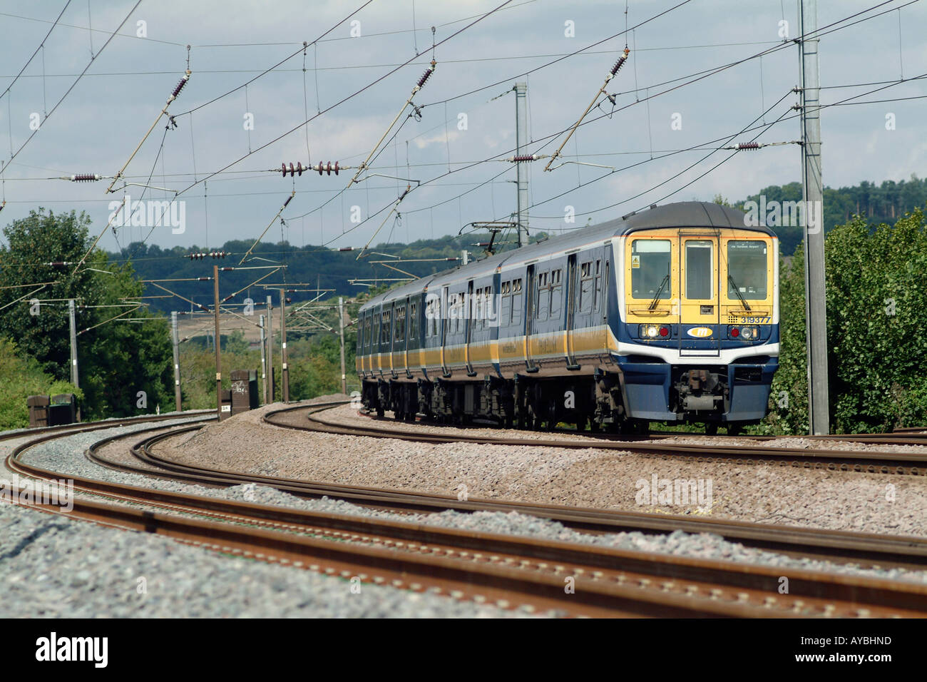 Thameslink class 319 train travelling through the british countryside ...